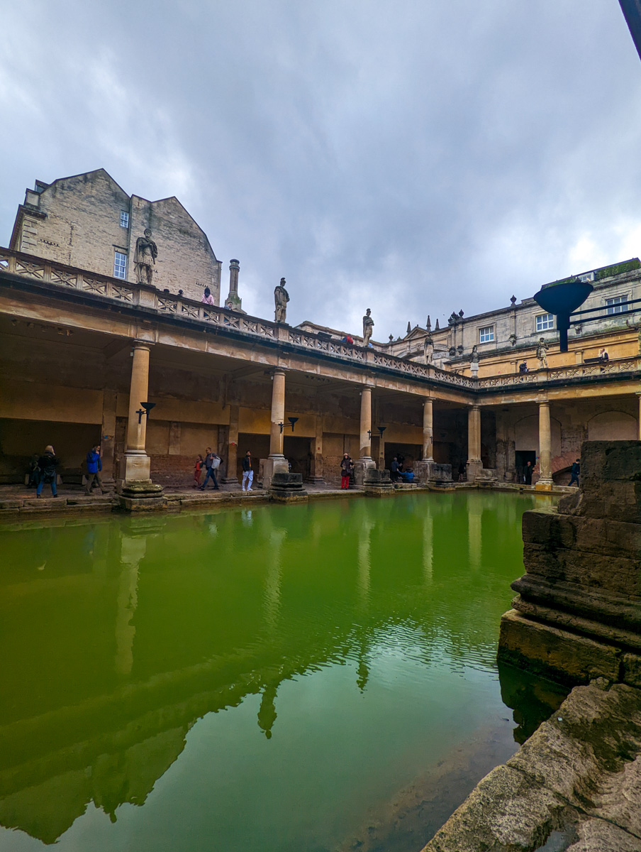 Why did Romans settle in Bath?